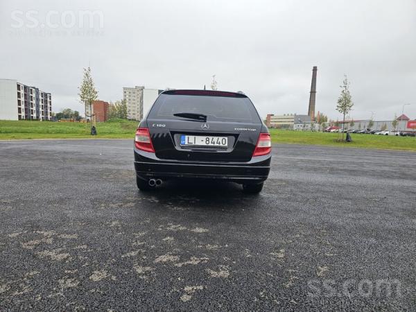 Black Mercedes-Benz C 180 2009 in Jelgava, with an engine capacity of 1.60 L and mileage of 245 thousand km for 2950 €, photo 5 on AUTOMOTO.COM.LV