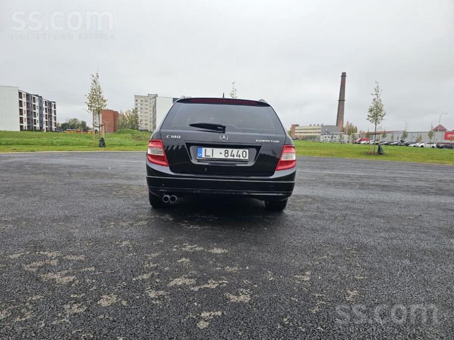 Black Mercedes-Benz C 180 2009 in Jelgava, with an engine capacity of 1.60 L and mileage of 245 thousand km for 2950 €, photo 5 on AUTOMOTO.COM.LV