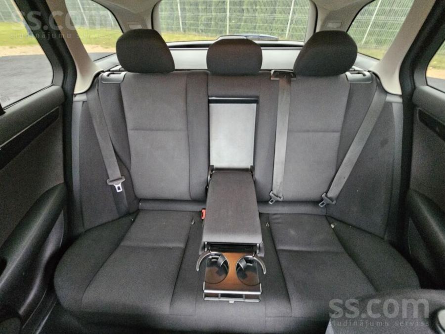 Black Mercedes-Benz C 180 2009 in Jelgava, with an engine capacity of 1.60 L and mileage of 245 thousand km for 2950 €, photo 9 on AUTOMOTO.COM.LV