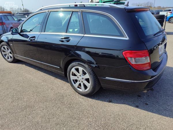 Black Mercedes-Benz C 180 2010 in Marijampole, with an engine capacity of 1.80 L and mileage of 233 thousand km for 4350 €, photo 4 on AUTOMOTO.COM.LV