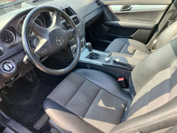 Black Mercedes-Benz C 180 2010 in Marijampole, with an engine capacity of 1.80 L and mileage of 233 thousand km for 4350 €, photo 5 on AUTOMOTO.COM.LV
