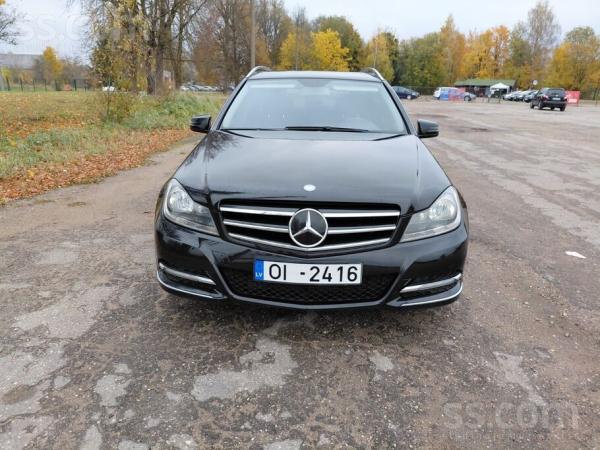 Black Mercedes-Benz C 180 2011 in Talsi, with an engine capacity of 2.20 L and mileage of 255 thousand km for 7600 €, photo 2 on AUTOMOTO.COM.LV