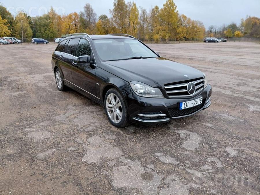 Black Mercedes-Benz C 180 2011 in Talsi, with an engine capacity of 2.20 L and mileage of 255 thousand km for 7600 €, photo 3 on AUTOMOTO.COM.LV