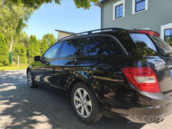 Black Mercedes-Benz C 180 2012 in Riga, with an engine capacity of 2.20 L and mileage of 361 thousand km for 6700 €, photo 4 on AUTOMOTO.COM.LV