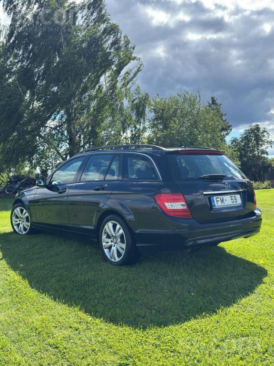 Black Mercedes-Benz C 180 2012 in Dobele, with an engine capacity of 2.10 L and mileage of 247 thousand km for 5259 €, photo 3 on AUTOMOTO.COM.LV