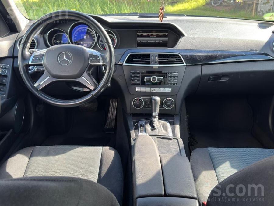 Black Mercedes-Benz C 180 2012 in Dobele, with an engine capacity of 2.10 L and mileage of 247 thousand km for 5259 €, photo 4 on AUTOMOTO.COM.LV