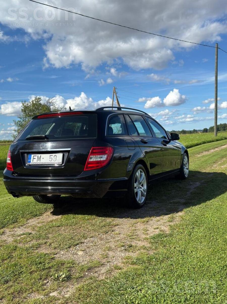 Black Mercedes-Benz C 180 2012 in Dobele, with an engine capacity of 2.10 L and mileage of 247 thousand km for 5259 €, photo 8 on AUTOMOTO.COM.LV
