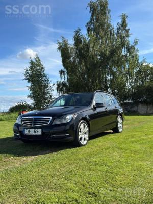 Black Mercedes-Benz C 180 2012 in Dobele, with an engine capacity of 2.10 L and mileage of 247 thousand km for 5259 €, photo 14 on AUTOMOTO.COM.LV