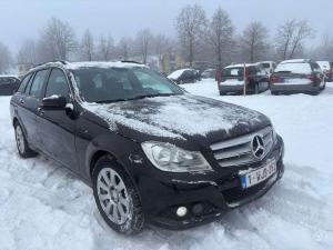 Black Mercedes-Benz C 180 2013 in Taurage, with an engine capacity of 2.14 L and mileage of 285 thousand km for 4200 €, photo 7 on AUTOMOTO.COM.LV