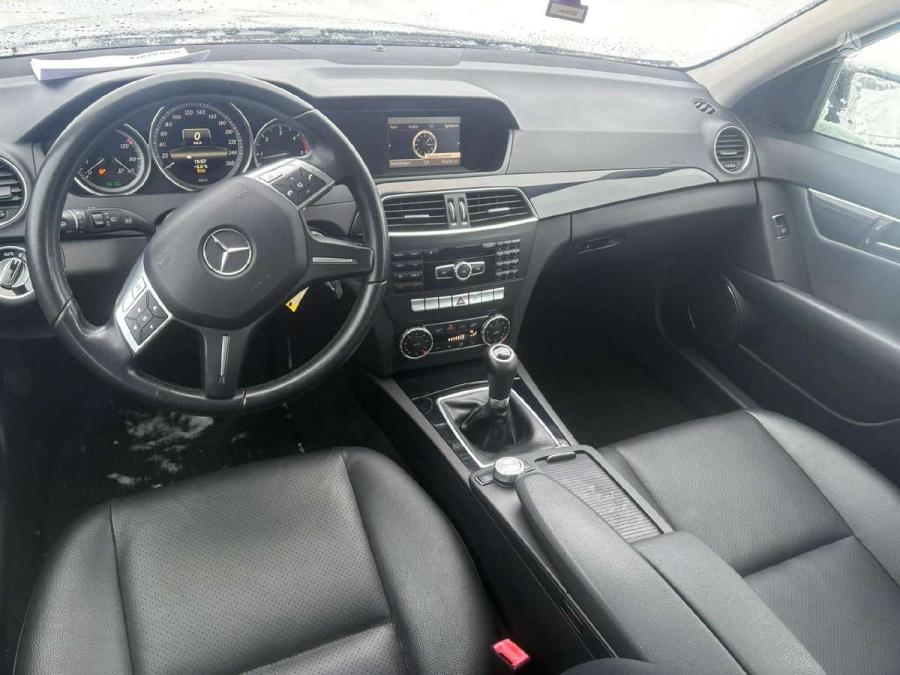 Black Mercedes-Benz C 180 2013 in Taurage, with an engine capacity of 2.14 L and mileage of 285 thousand km for 4200 €, photo 12 on AUTOMOTO.COM.LV