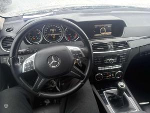 Black Mercedes-Benz C 180 2013 in Taurage, with an engine capacity of 2.14 L and mileage of 285 thousand km for 4200 €, photo 14 on AUTOMOTO.COM.LV