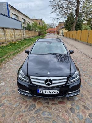 Black Mercedes-Benz C 180 2014 in Jelgava, with an engine capacity of 2.20 L and mileage of 347 thousand km for 6750 €, photo  on AUTOMOTO.COM.LV