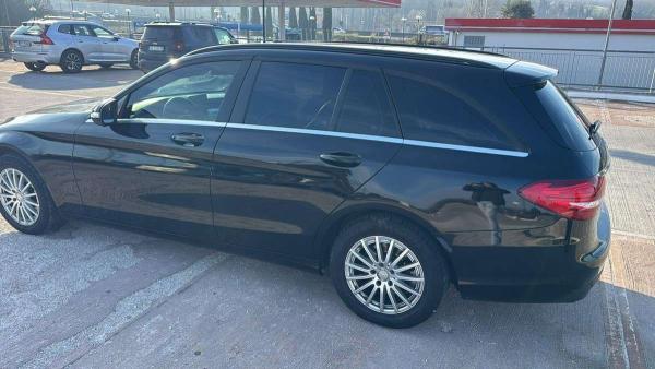 Black Mercedes-Benz C 180 2015 in Siauliai, with an engine capacity of 1.60 L and mileage of 249 thousand km for 7500 €, photo 5 on AUTOMOTO.COM.LV