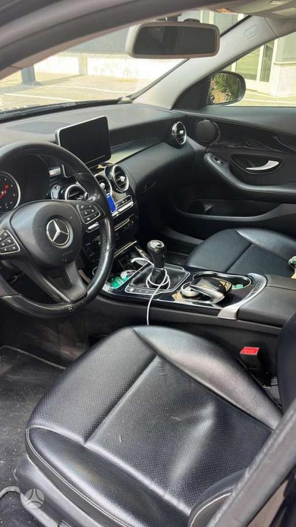 Black Mercedes-Benz C 180 2015 in Siauliai, with an engine capacity of 1.60 L and mileage of 249 thousand km for 7500 €, photo 9 on AUTOMOTO.COM.LV