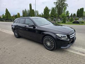 Black Mercedes-Benz C 180 2015 in Kaunas, with an engine capacity of 1.50 L and mileage of 160 thousand km for 9800 €, photo  on AUTOMOTO.COM.LV
