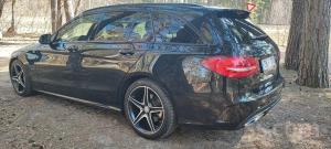 Black Mercedes-Benz C 180 2017 in Riga, with an engine capacity of 1.60 L and mileage of 209 thousand km for 11700 €, photo 6 on AUTOMOTO.COM.LV