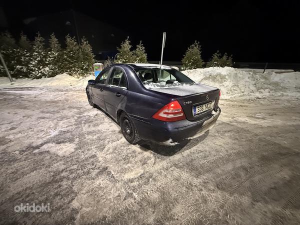 Blue Mercedes-Benz C 180 2004 in Tallinn, with an engine capacity of 1.80 L and mileage of 154 thousand km for 2000 €, photo 4 on AUTOMOTO.COM.LV