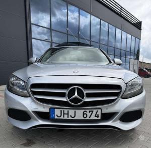 Grey Mercedes-Benz C 180 2015 in Siauliai, with an engine capacity of 1.60 L and mileage of 220 thousand km for 10999 €, photo 5 on AUTOMOTO.COM.LV