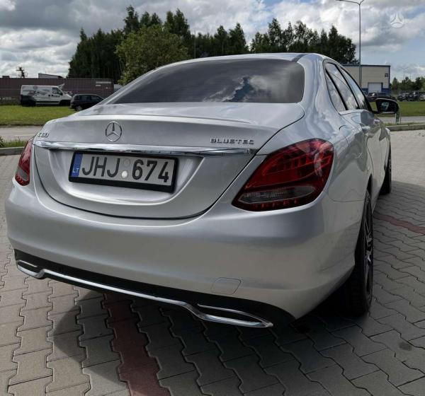 Grey Mercedes-Benz C 180 2015 in Siauliai, with an engine capacity of 1.60 L and mileage of 220 thousand km for 10999 €, photo 7 on AUTOMOTO.COM.LV