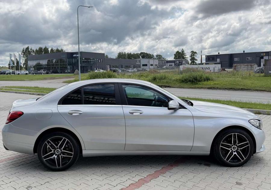 Grey Mercedes-Benz C 180 2015 in Siauliai, with an engine capacity of 1.60 L and mileage of 220 thousand km for 10999 €, photo 9 on AUTOMOTO.COM.LV