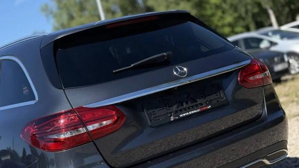 Grey Mercedes-Benz C 180 2015 in Jelgava, with an engine capacity of 1.60 L and mileage of 241 thousand km for 9990 €, photo 6 on AUTOMOTO.COM.LV
