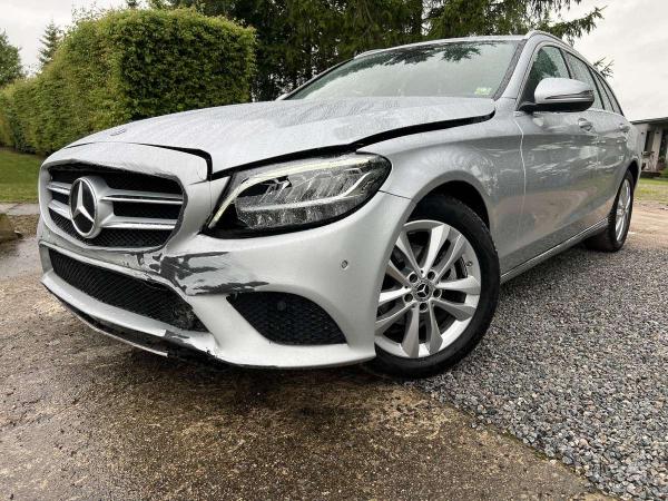 Grey Mercedes-Benz C 180 2019 in Kaunas, with an engine capacity of 1.60 L and mileage of 301 thousand km for 8450 €, photo 4 on AUTOMOTO.COM.LV