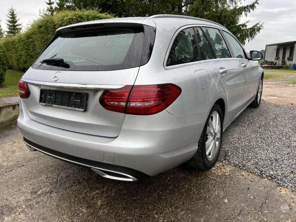 Grey Mercedes-Benz C 180 2019 in Kaunas, with an engine capacity of 1.60 L and mileage of 301 thousand km for 8450 €, photo 5 on AUTOMOTO.COM.LV