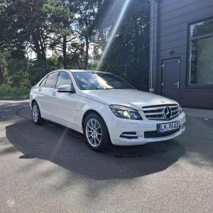 White Mercedes-Benz C 180 2010 in Utena, with an engine capacity of 1.80 L and mileage of 198 thousand km for 5600 €, photo  on AUTOMOTO.COM.LV