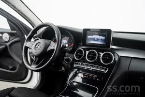 White Mercedes-Benz C 180 2018 in Tallinn, with an engine capacity of 1.60 L and mileage of 269 thousand km for 12499 €, photo 12 on AUTOMOTO.COM.LV