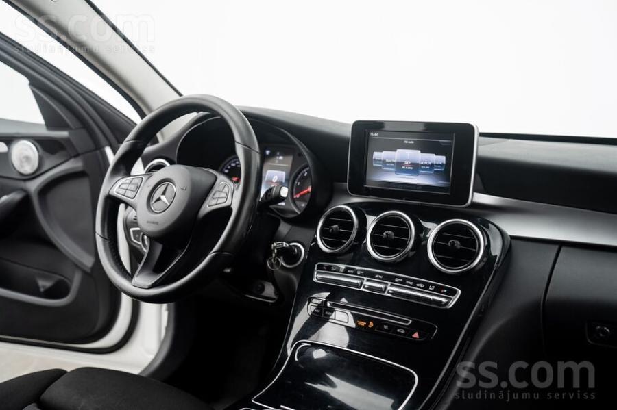 White Mercedes-Benz C 180 2018 in Tallinn, with an engine capacity of 1.60 L and mileage of 269 thousand km for 12499 €, photo 12 on AUTOMOTO.COM.LV