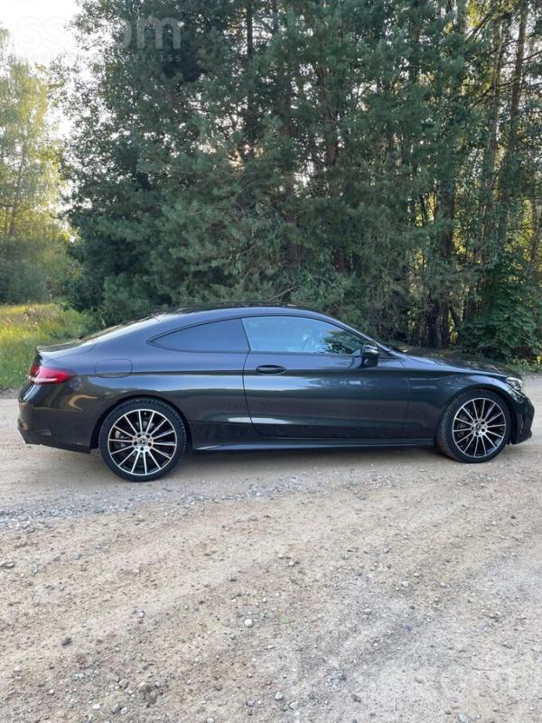 Black Mercedes-Benz C 200 2021 in Ogre, with an engine capacity of 2.00 L and mileage of 192 thousand km for 28000 €, photo 1 on AUTOMOTO.COM.LV