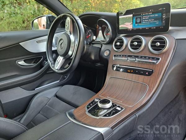 Black Mercedes-Benz C 200 2021 in Ogre, with an engine capacity of 2.00 L and mileage of 192 thousand km for 28000 €, photo 5 on AUTOMOTO.COM.LV