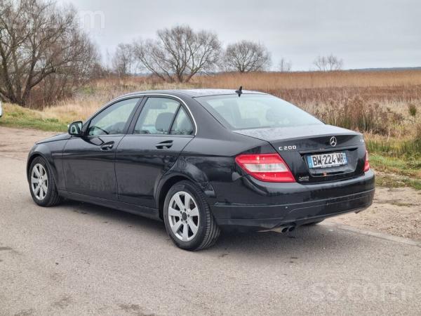 Black Mercedes-Benz C 200 2007 in Liepaja, with an engine capacity of 2.10 L and mileage of 265 thousand km for 3300 €, photo 2 on AUTOMOTO.COM.LV