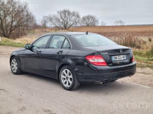 Black Mercedes-Benz C 200 2007 in Liepaja, with an engine capacity of 2.10 L and mileage of 265 thousand km for 3200 €, photo 3 on AUTOMOTO.COM.LV