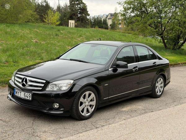 Black Mercedes-Benz C 200 2008 in Siauliai, with an engine capacity of 1.80 L and mileage of 227 thousand km for 6400 €, photo 1 on AUTOMOTO.COM.LV