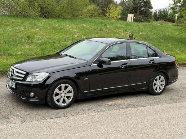 Black Mercedes-Benz C 200 2008 in Siauliai, with an engine capacity of 1.80 L and mileage of 227 thousand km for 6400 €, photo 2 on AUTOMOTO.COM.LV