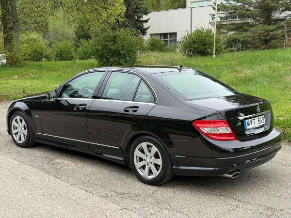 Black Mercedes-Benz C 200 2008 in Siauliai, with an engine capacity of 1.80 L and mileage of 227 thousand km for 6400 €, photo 4 on AUTOMOTO.COM.LV