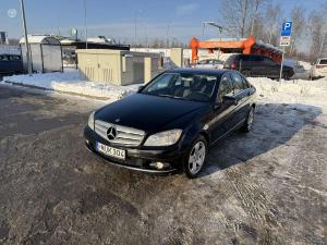 Black Mercedes-Benz C 200 2009 in Vilnius, with an engine capacity of 2.15 L and mileage of 219 thousand km for 4600 €, photo  on AUTOMOTO.COM.LV