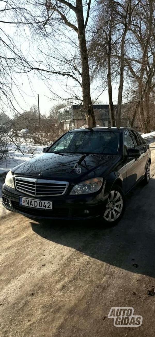 Black Mercedes-Benz C 200 2009 in Vilnius, with an engine capacity of 2.10 L and mileage of 341 thousand km for 4990 €, photo 1 on AUTOMOTO.COM.LV