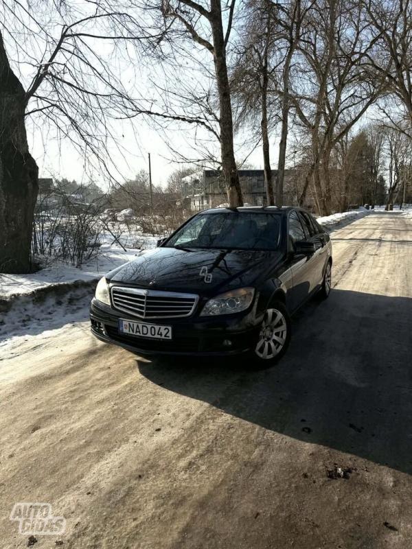 Black Mercedes-Benz C 200 2009 in Vilnius, with an engine capacity of 2.10 L and mileage of 341 thousand km for 4990 €, photo 2 on AUTOMOTO.COM.LV