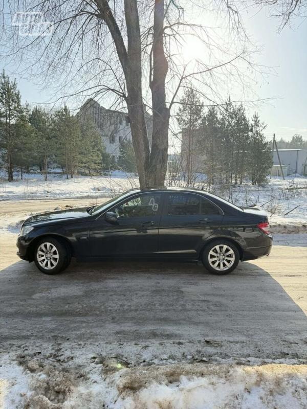 Black Mercedes-Benz C 200 2009 in Vilnius, with an engine capacity of 2.10 L and mileage of 341 thousand km for 4990 €, photo 3 on AUTOMOTO.COM.LV