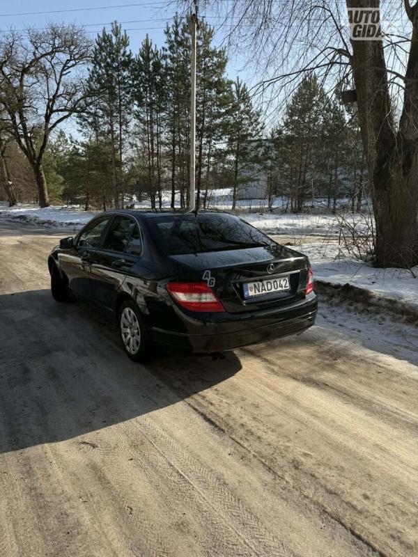 Black Mercedes-Benz C 200 2009 in Vilnius, with an engine capacity of 2.10 L and mileage of 341 thousand km for 4990 €, photo 4 on AUTOMOTO.COM.LV