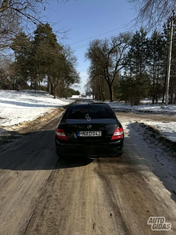 Black Mercedes-Benz C 200 2009 in Vilnius, with an engine capacity of 2.10 L and mileage of 341 thousand km for 4990 €, photo 5 on AUTOMOTO.COM.LV