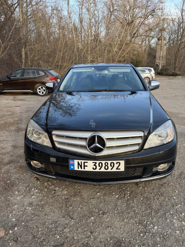 Black Mercedes-Benz C 200 2009 in Panevezys, with an engine capacity of 2.00 L and mileage of 400 thousand km for 2300 €, photo 1 on AUTOMOTO.COM.LV