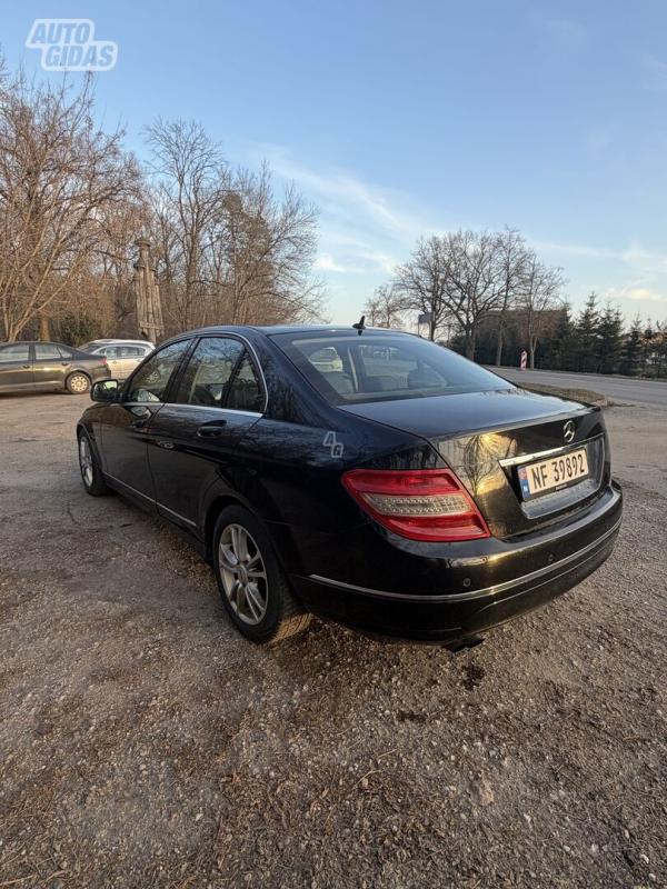 Black Mercedes-Benz C 200 2009 in Panevezys, with an engine capacity of 2.00 L and mileage of 400 thousand km for 2300 €, photo 6 on AUTOMOTO.COM.LV