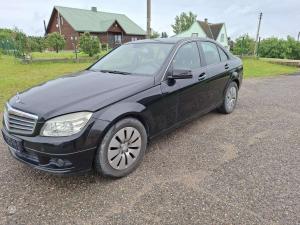 Black Mercedes-Benz C 200 2009 in Rokiskis, with an engine capacity of 2.15 L and mileage of 282 thousand km for 1600 €, photo 3 on AUTOMOTO.COM.LV