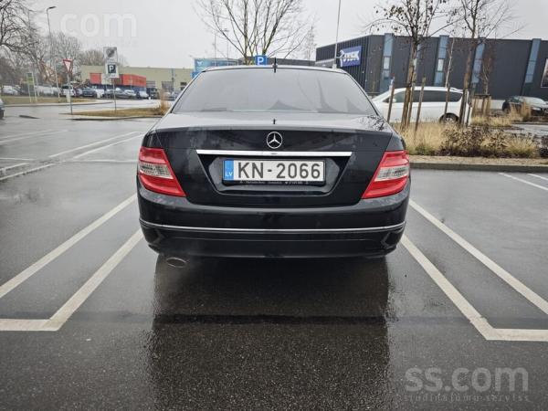 Black Mercedes-Benz C 200 2010 in Riga, with an engine capacity of 1.80 L and mileage of 184 thousand km for 6100 €, photo 3 on AUTOMOTO.COM.LV