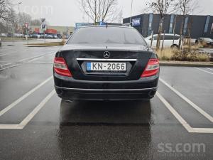 Black Mercedes-Benz C 200 2010 in Riga, with an engine capacity of 1.80 L and mileage of 184 thousand km for 6100 €, photo 3 on AUTOMOTO.COM.LV