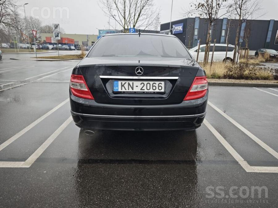Black Mercedes-Benz C 200 2010 in Riga, with an engine capacity of 1.80 L and mileage of 184 thousand km for 6100 €, photo 3 on AUTOMOTO.COM.LV