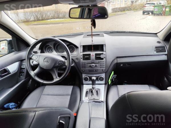 Black Mercedes-Benz C 200 2010 in Riga, with an engine capacity of 1.80 L and mileage of 184 thousand km for 6100 €, photo 4 on AUTOMOTO.COM.LV